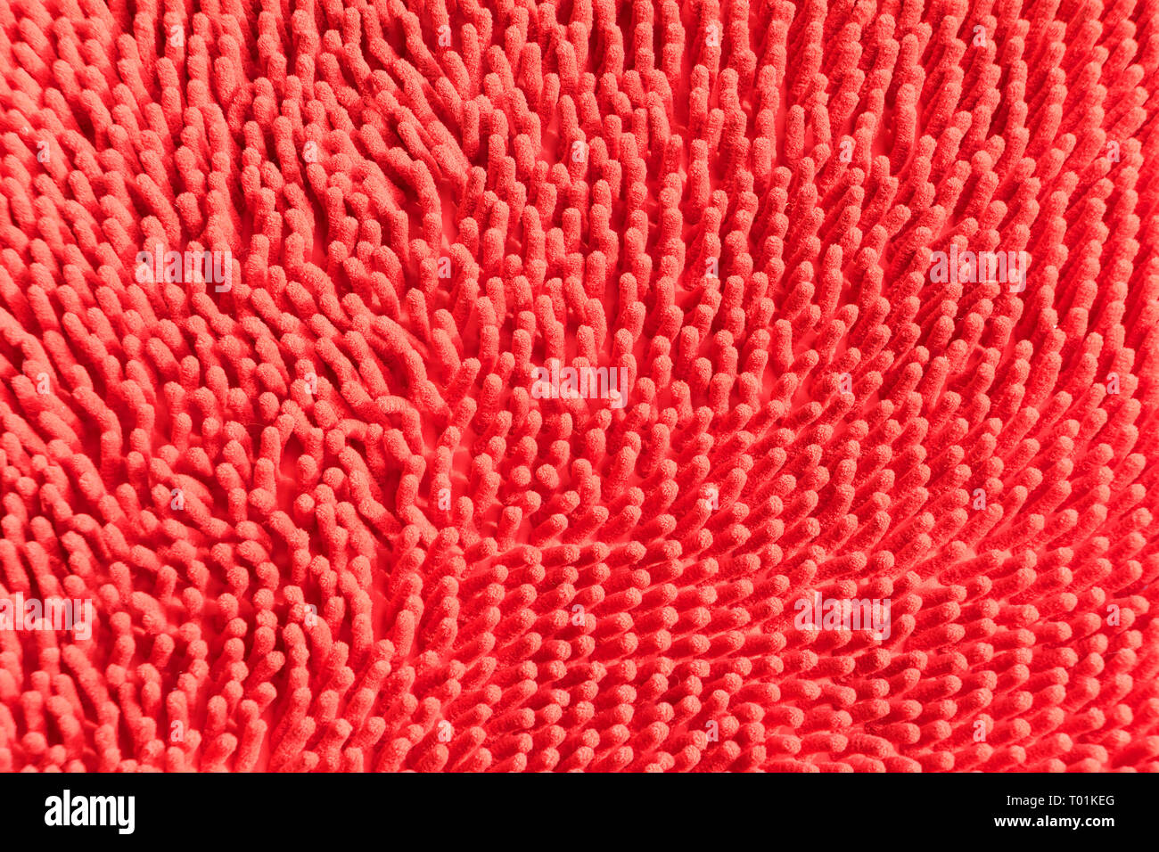 Cotton fabric red scarlet color texture background with copy space add ...