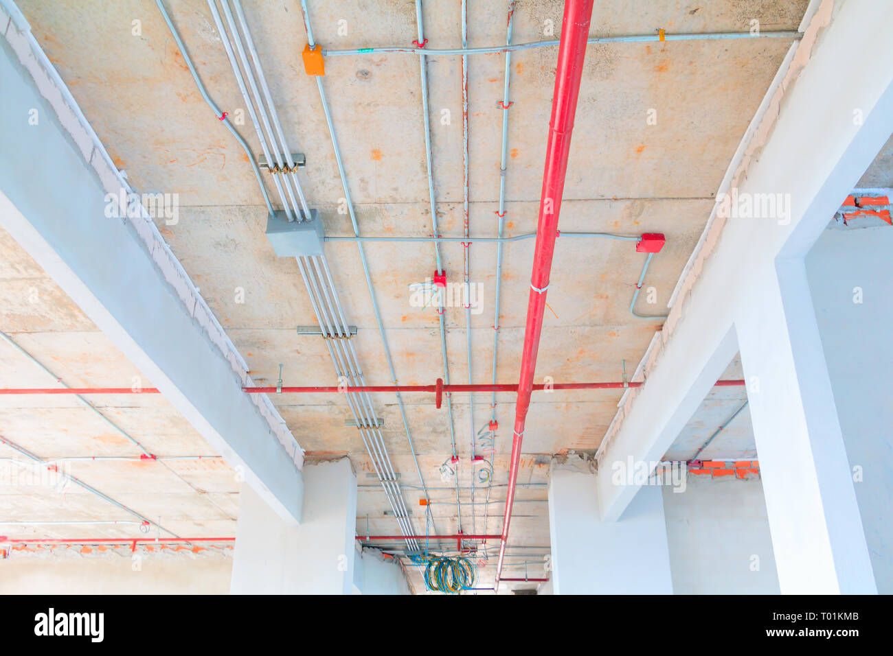 Metal pipes interior in Construction and fire sprinkler on red pipe are ...
