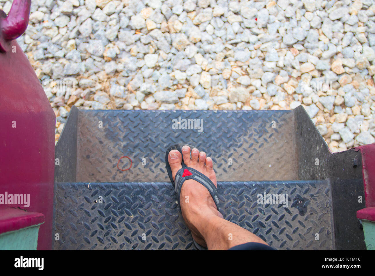 foot on steel stair up and down of train Stock Photo - Alamy
