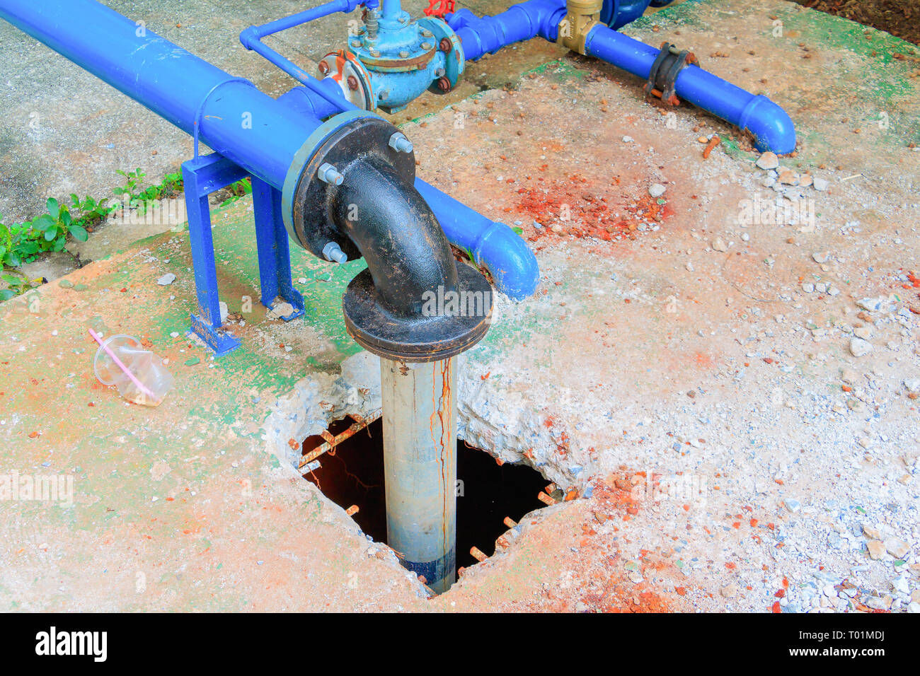 plumbing tube New repair On the hole cement floor Stock Photo - Alamy