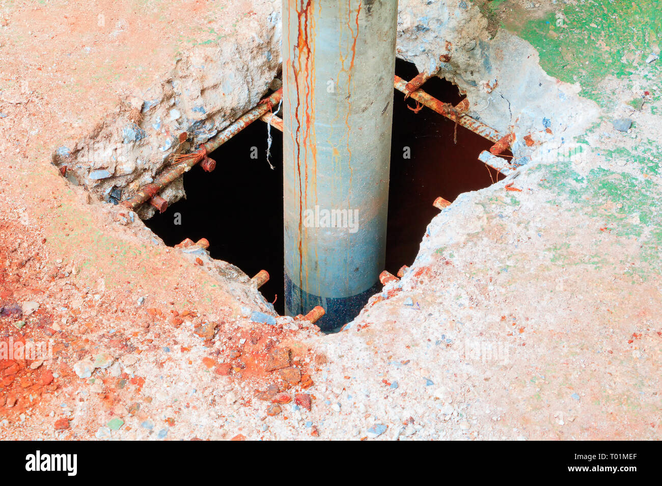plumbing tube New repair On the hole cement floor Stock Photo - Alamy