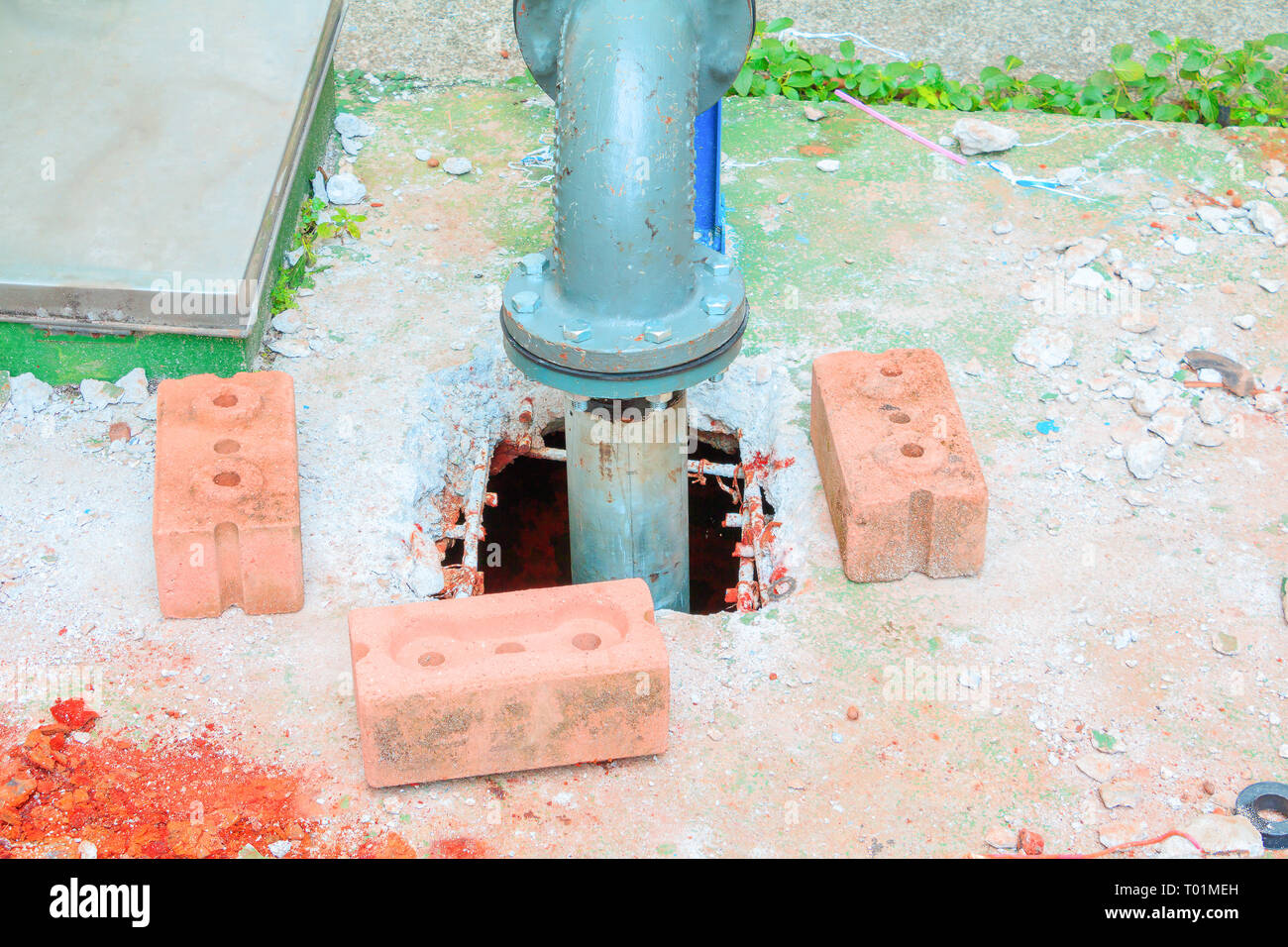 plumbing tube New repair On the hole cement floor Stock Photo - Alamy