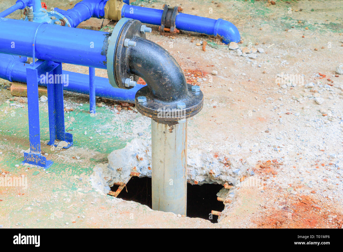 plumbing tube New repair On the hole cement floor Stock Photo - Alamy