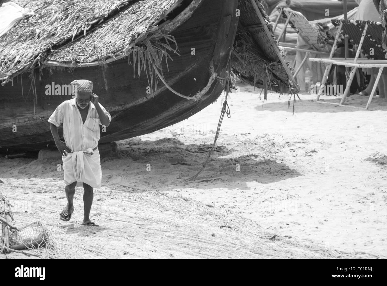Rowing fishing boats in Black and White Stock Photos & Images - Alamy