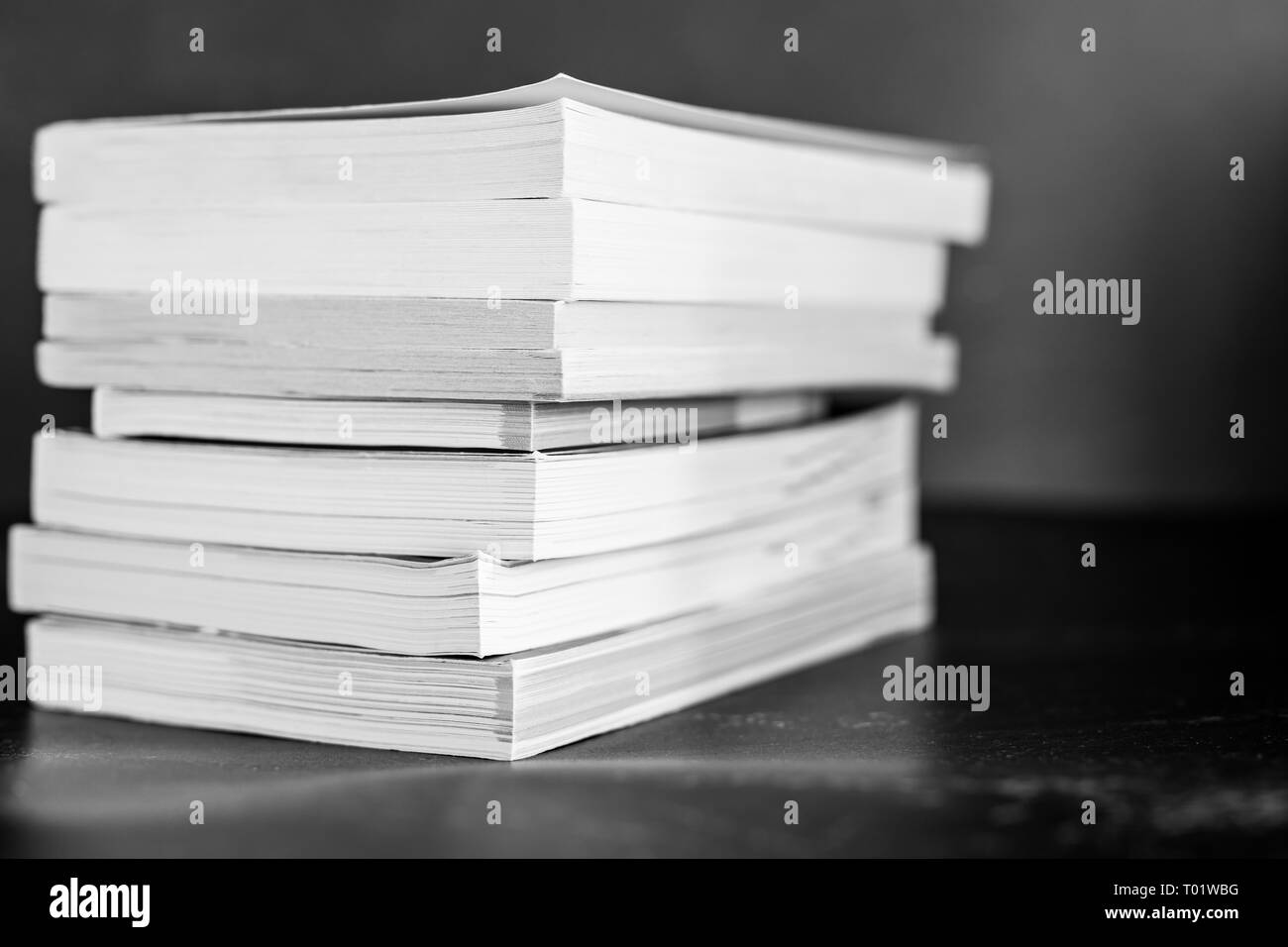 decluttering and tidying up concept: selecting which books to keep and ...