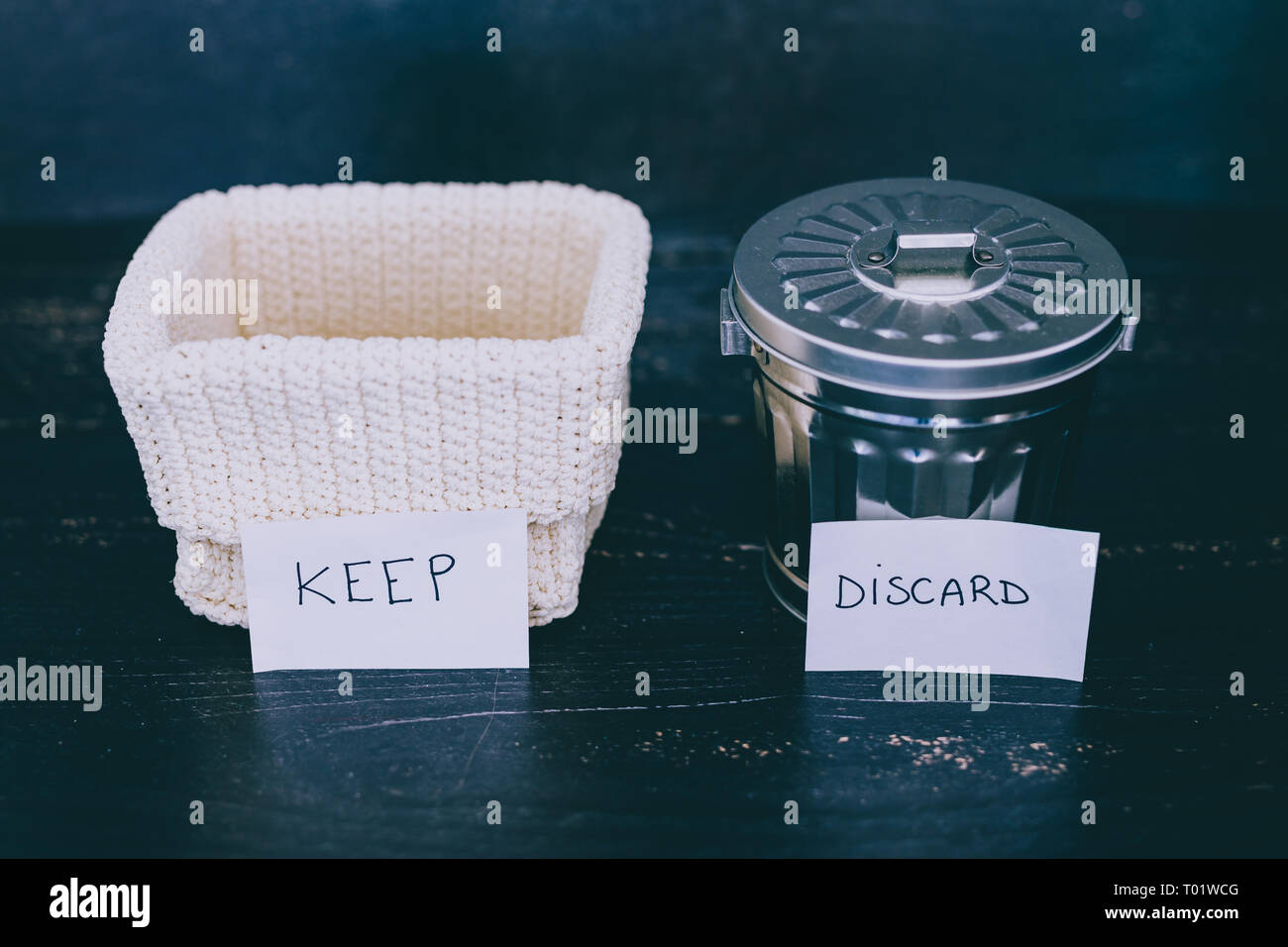 decluttering and tidying up concept: storage basket and gargabe bin to ...