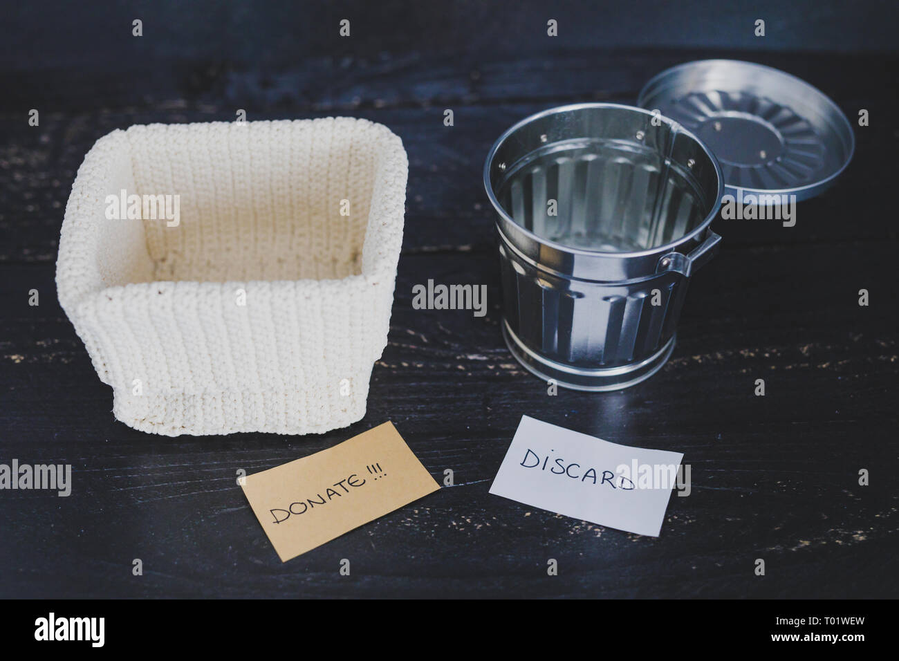 decluttering and tidying up concept: storage basket and gargabe bin to ...