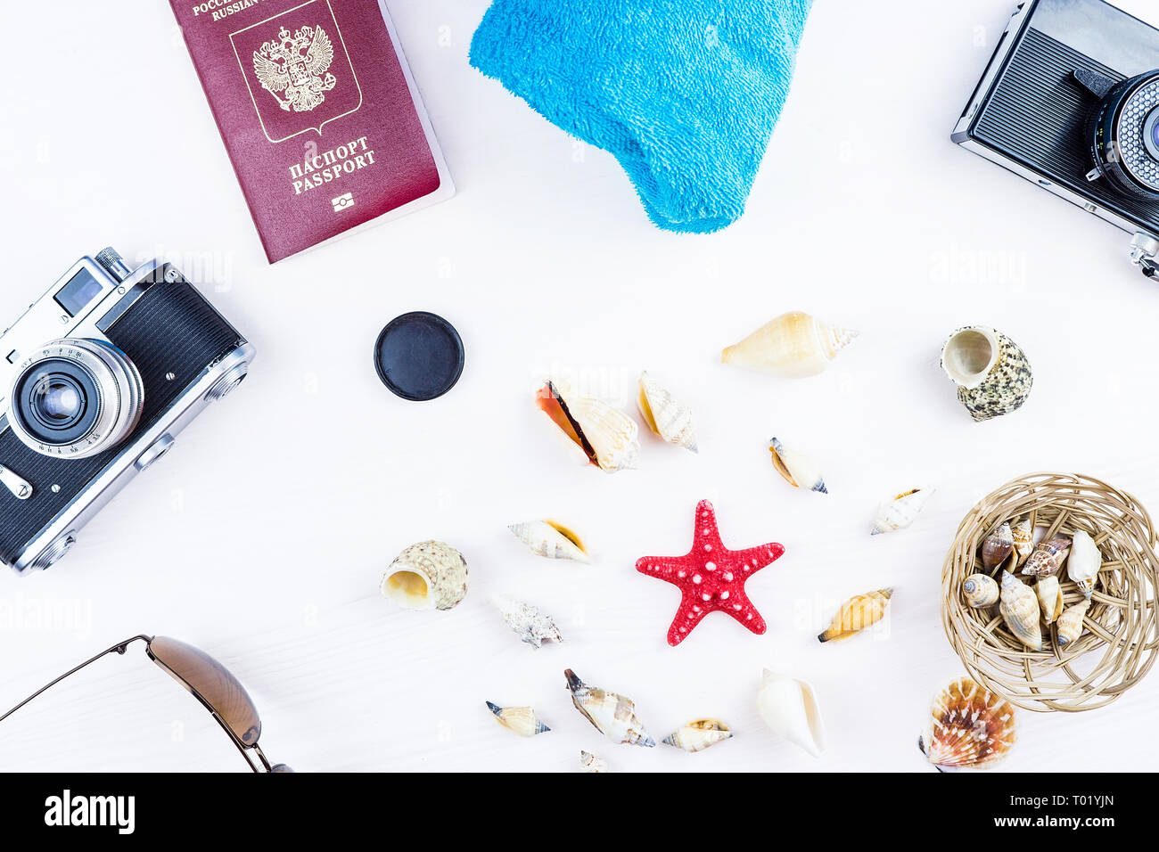 Seashells and camera on white background, passport, travel Stock Photo ...