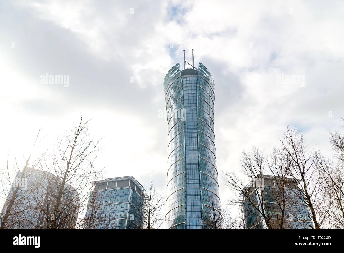 Glass skyscrapers of irregular shape. Bottom view. Abstract ...