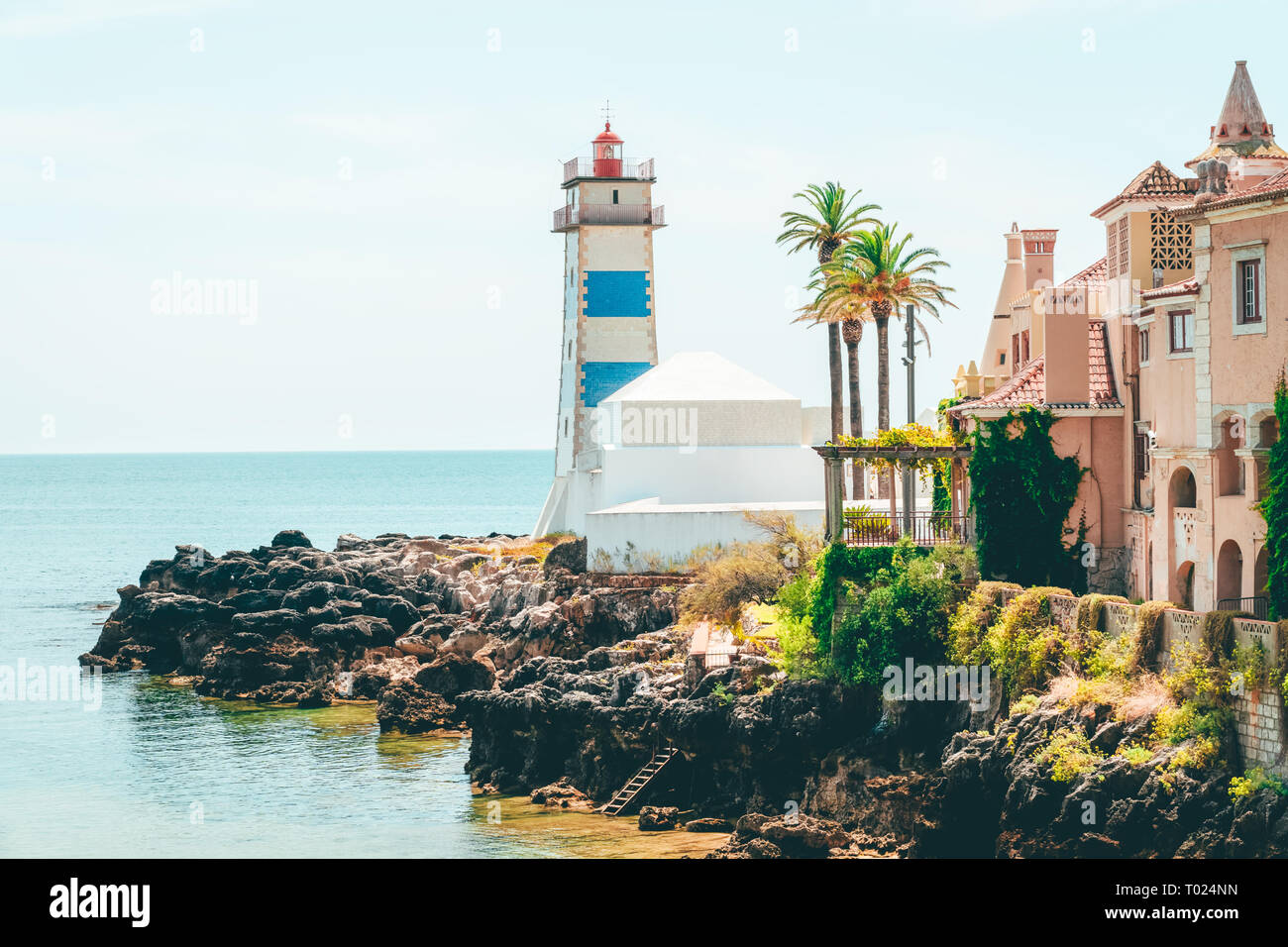 Old Portuguese Building And Lighthouse Landscape Near The Ocean Stock ...