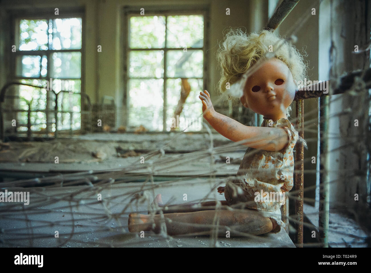 Old doll in Chornobyl exclusion zone. Radioactive zone in Pripyat city ...