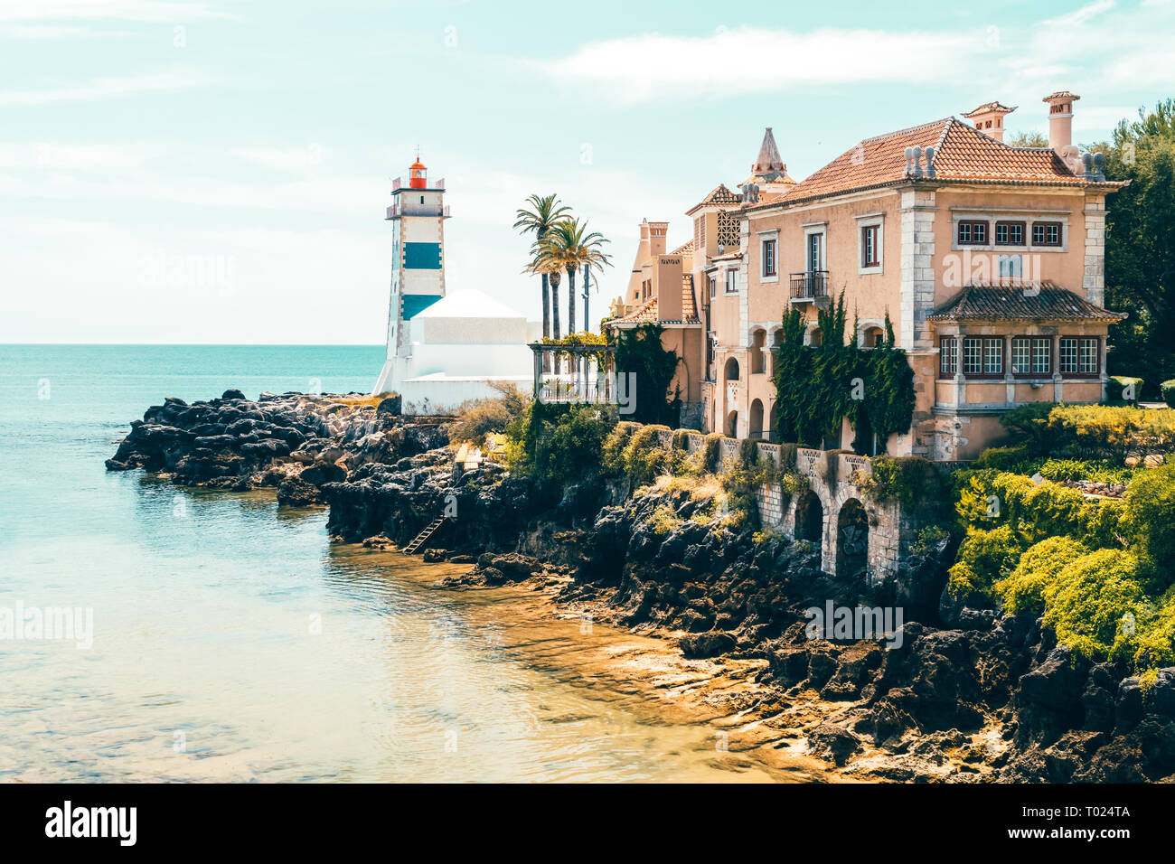 Old Portuguese Building And Lighthouse Landscape Near The Ocean Stock ...