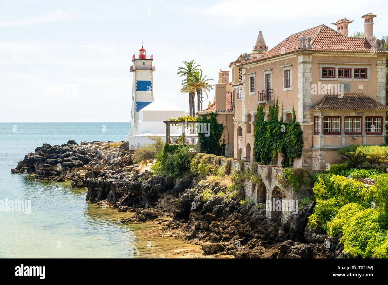 Old Portuguese Building And Lighthouse Landscape Near The Ocean Stock ...