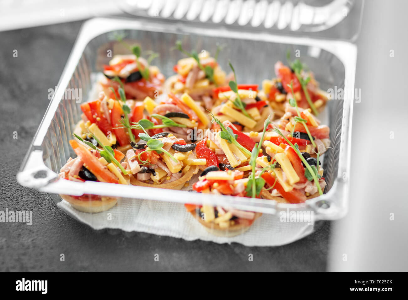 Delicious snacks with meat and vegetables in lunch box. Concept of food ...