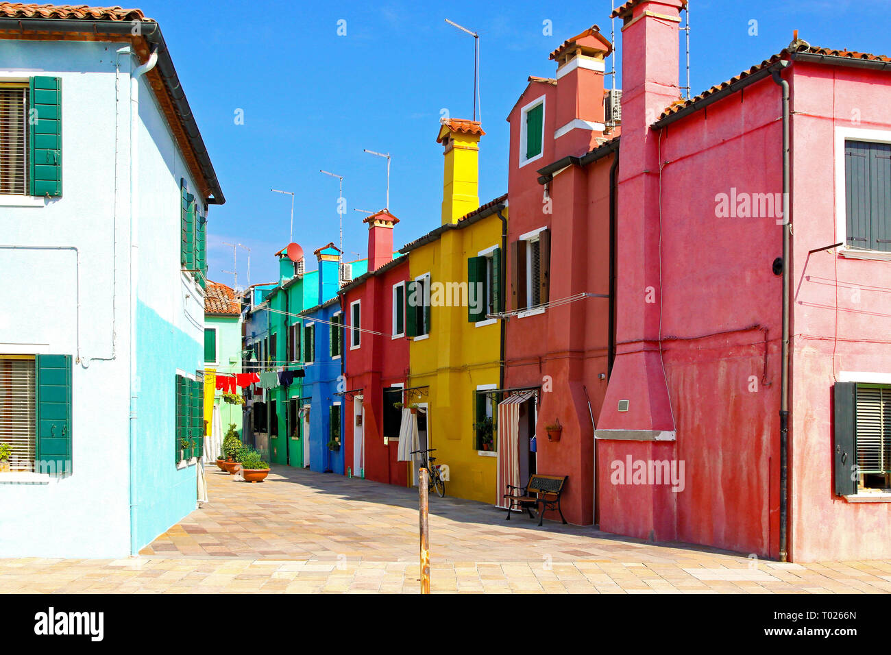 Old retro Mediterranean street with colorful houses Stock Photo - Alamy