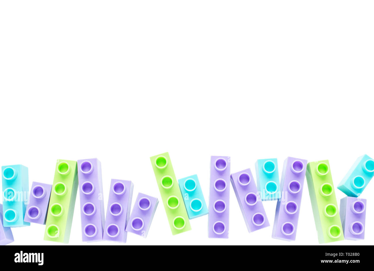 Children's color brick on an isolated background. Copy space. The ...