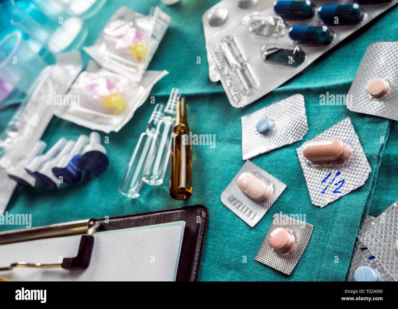 Different dosage medication in hospital, conceptual image, horizontal ...