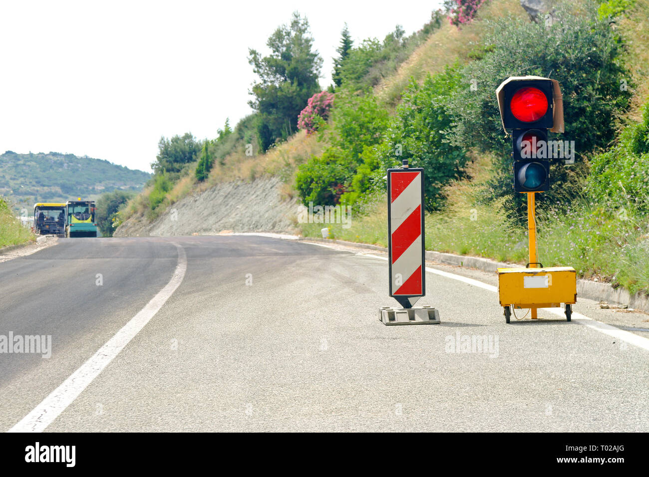 Red traffic light signal for road maintenance Stock Photo - Alamy