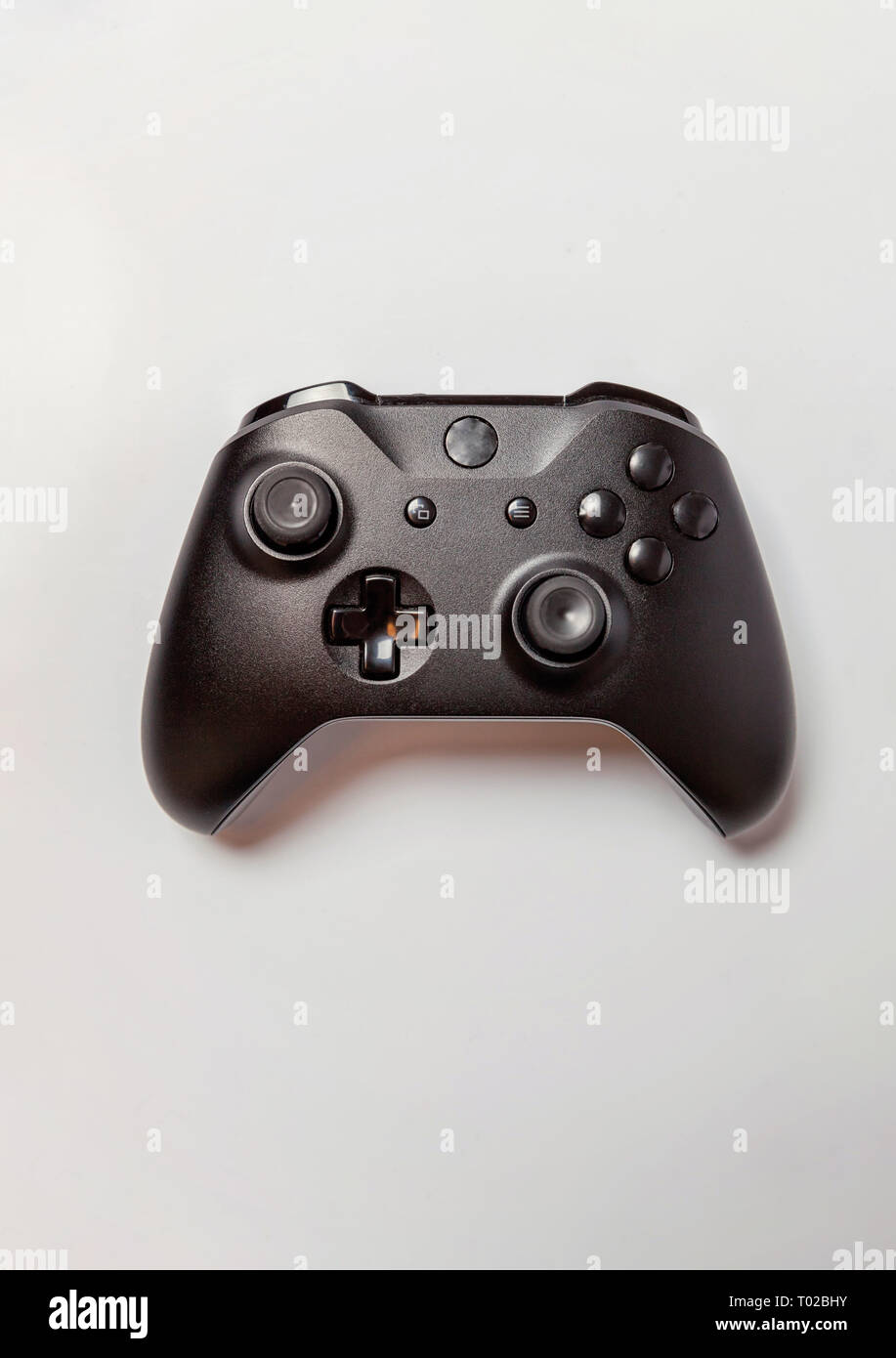 Black joystick gamepad, game console isolated on white background. Computer gaming technology ...