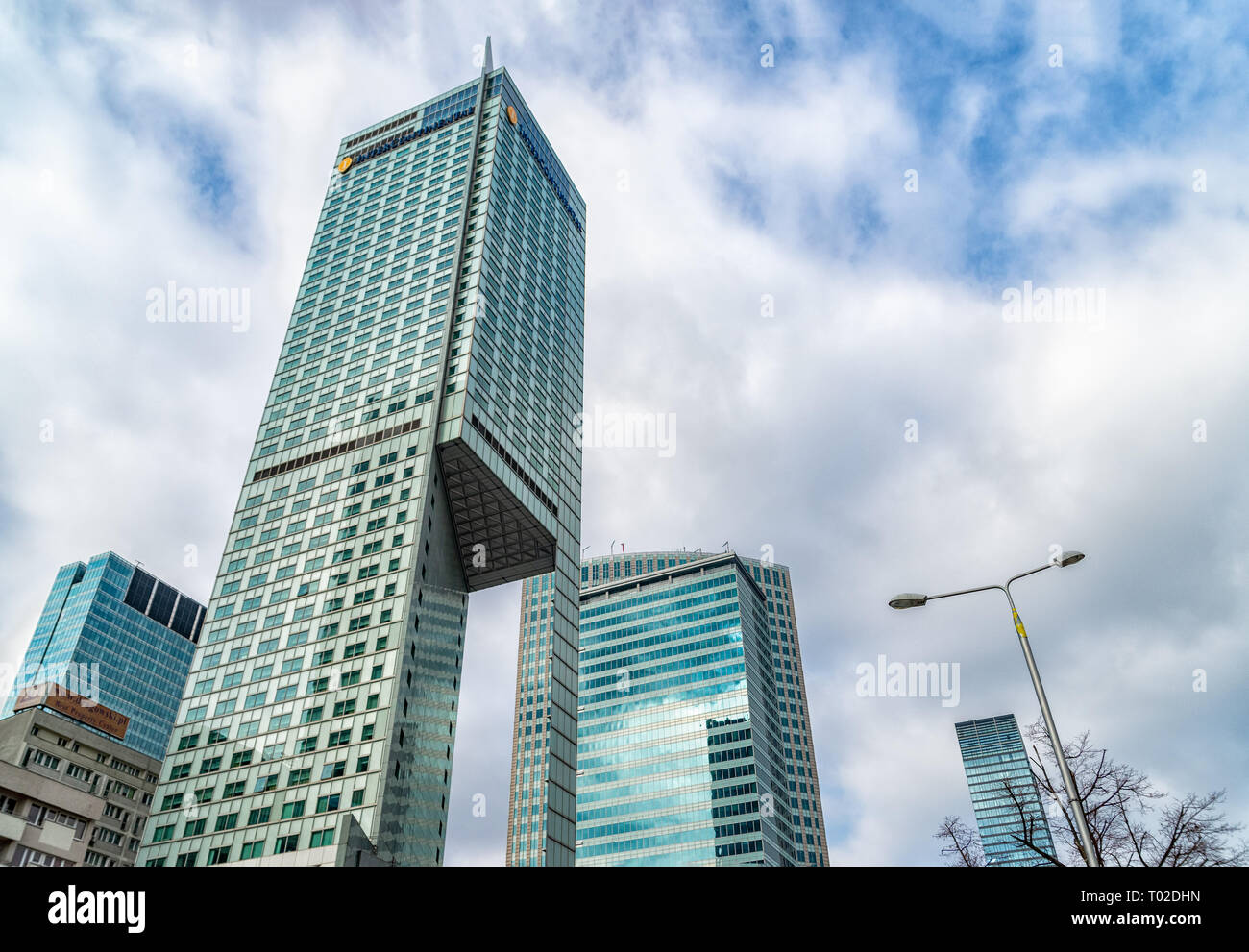 Glass skyscrapers of irregular shape. Bottom view. Abstract ...