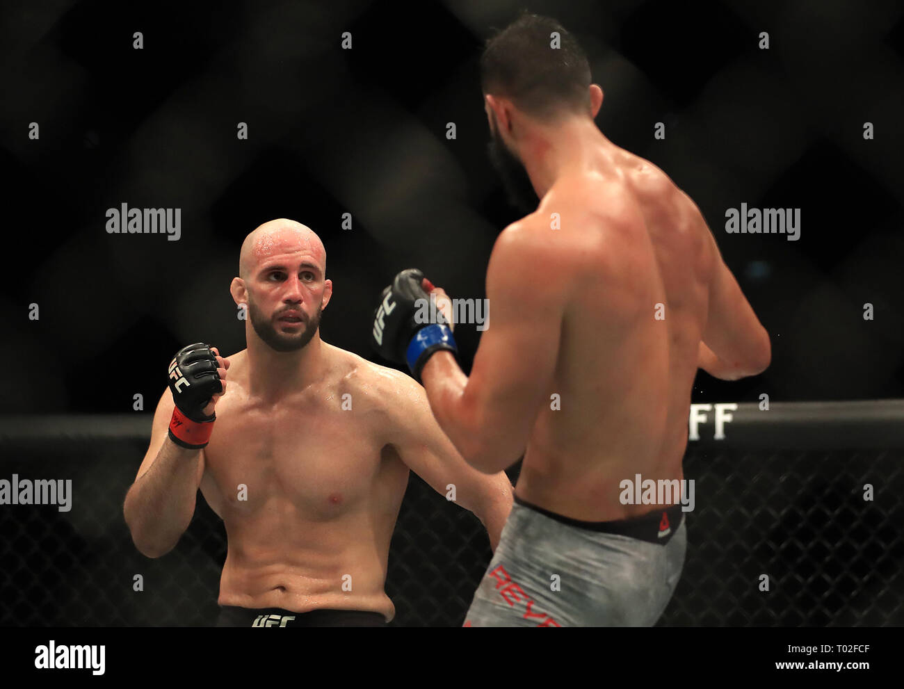 Volkan Oezdemir and Dominick Reyes (right) in action during their Light ...