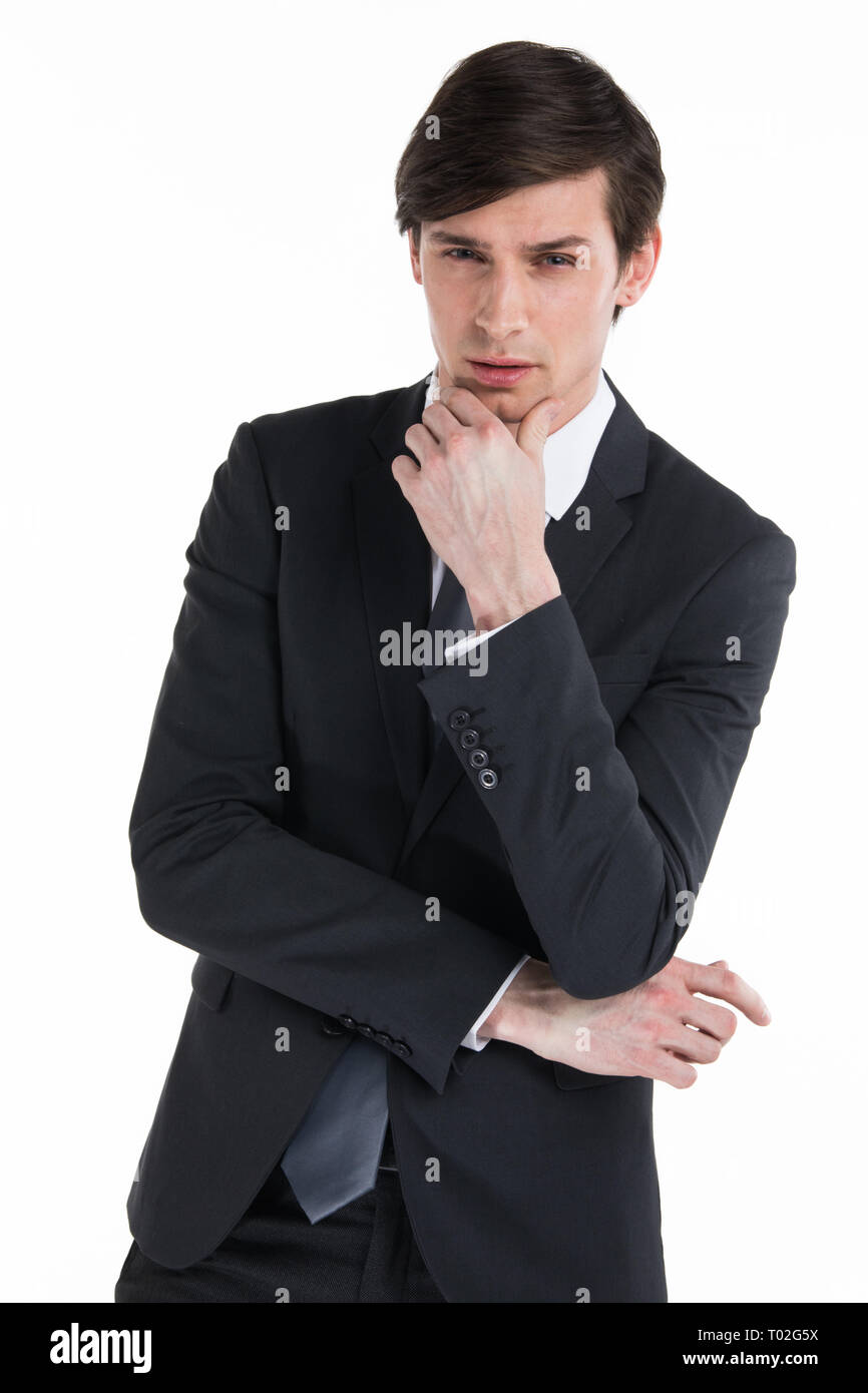 Frowning business man thinking over serious decision. Confident young ...