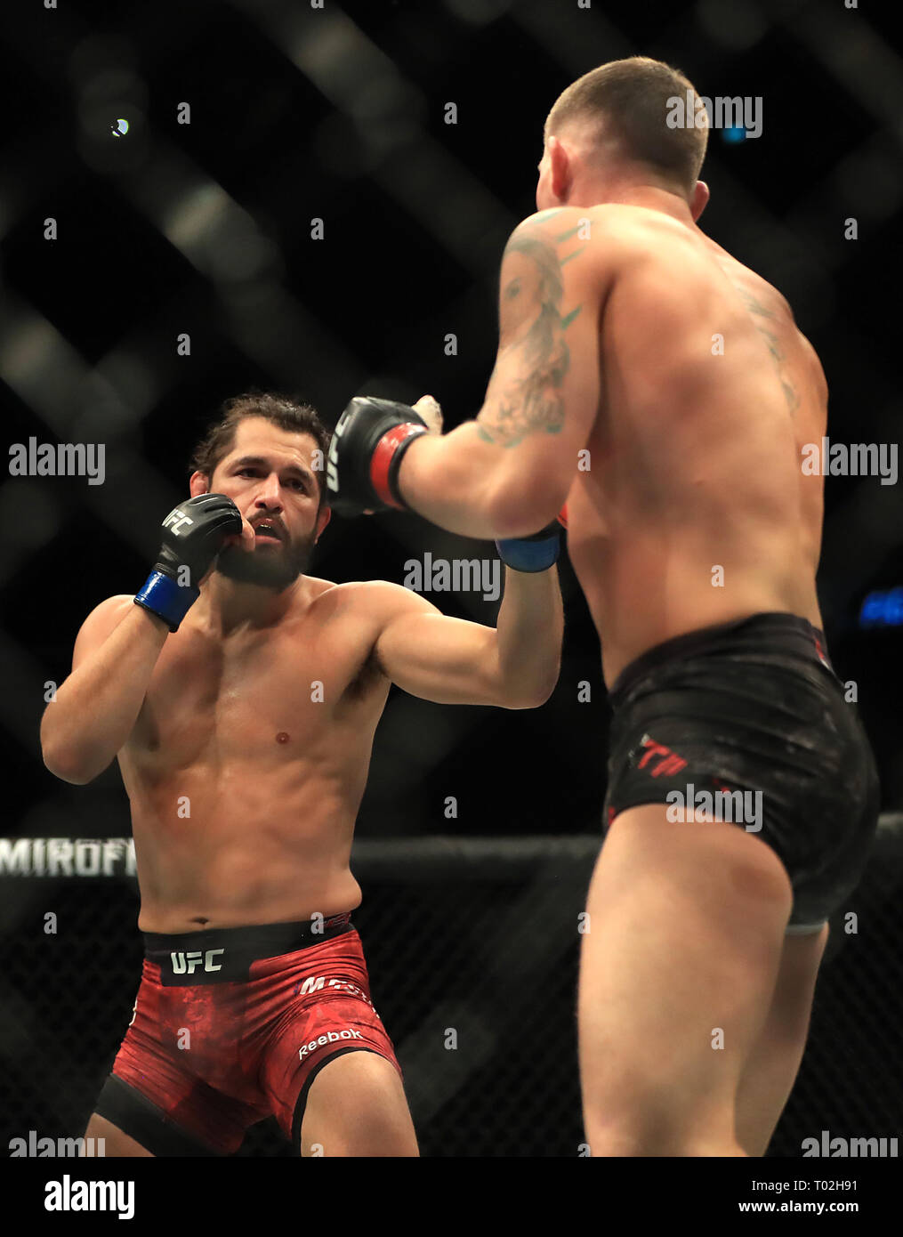 Darren Till Right And Jorge Masvidal In Action During Their