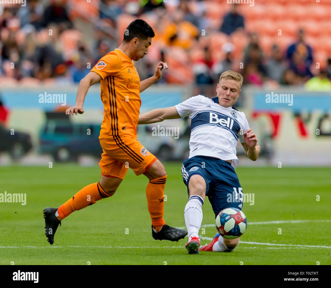 Texas, USA. March 16, 2019: Houston Dynamo midfielder Memo Rodriguez (8) and Vancouver Whitecaps ...
