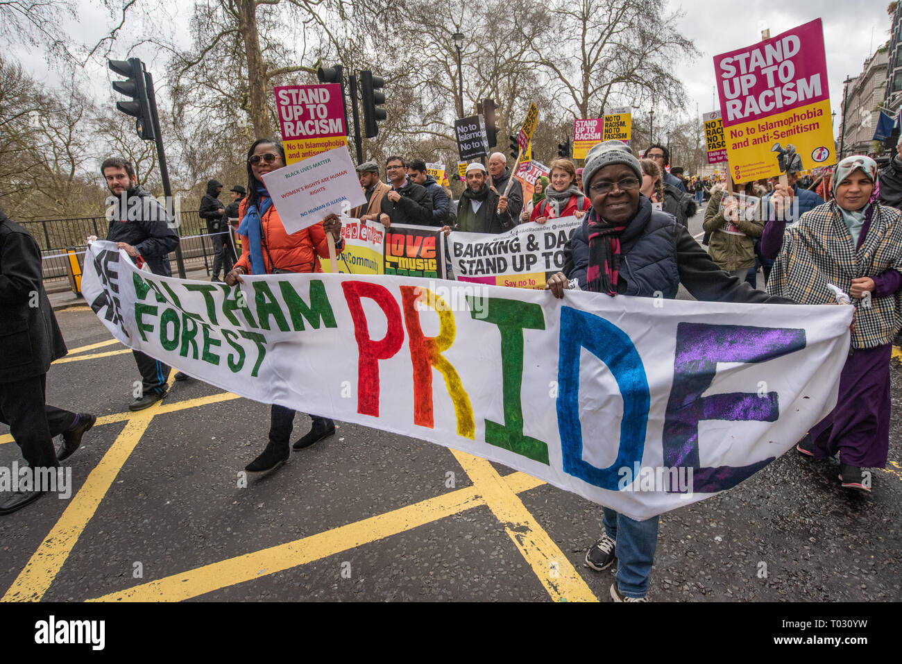 London, UK. 16th March 2019. Waltham Forest Pride banner on the march ...