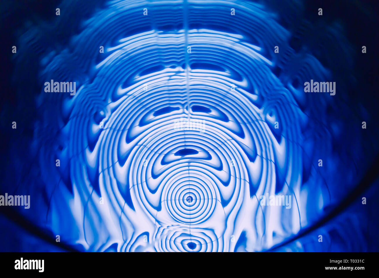 Sound waves in the visible blue color in the dark Stock Photo - Alamy