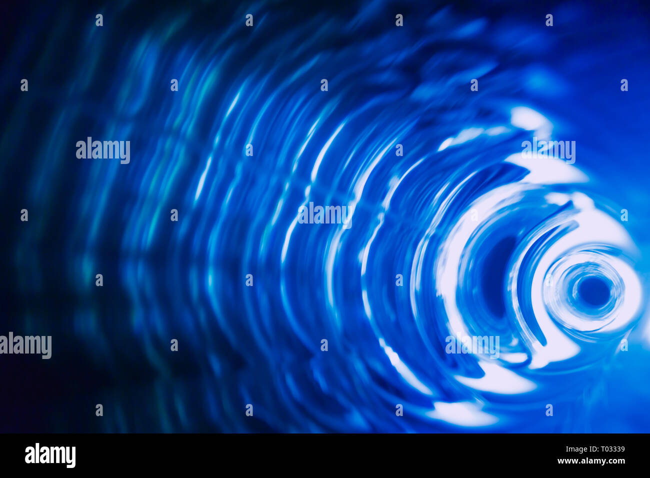 Sound waves in the visible blue color in the dark Stock Photo - Alamy