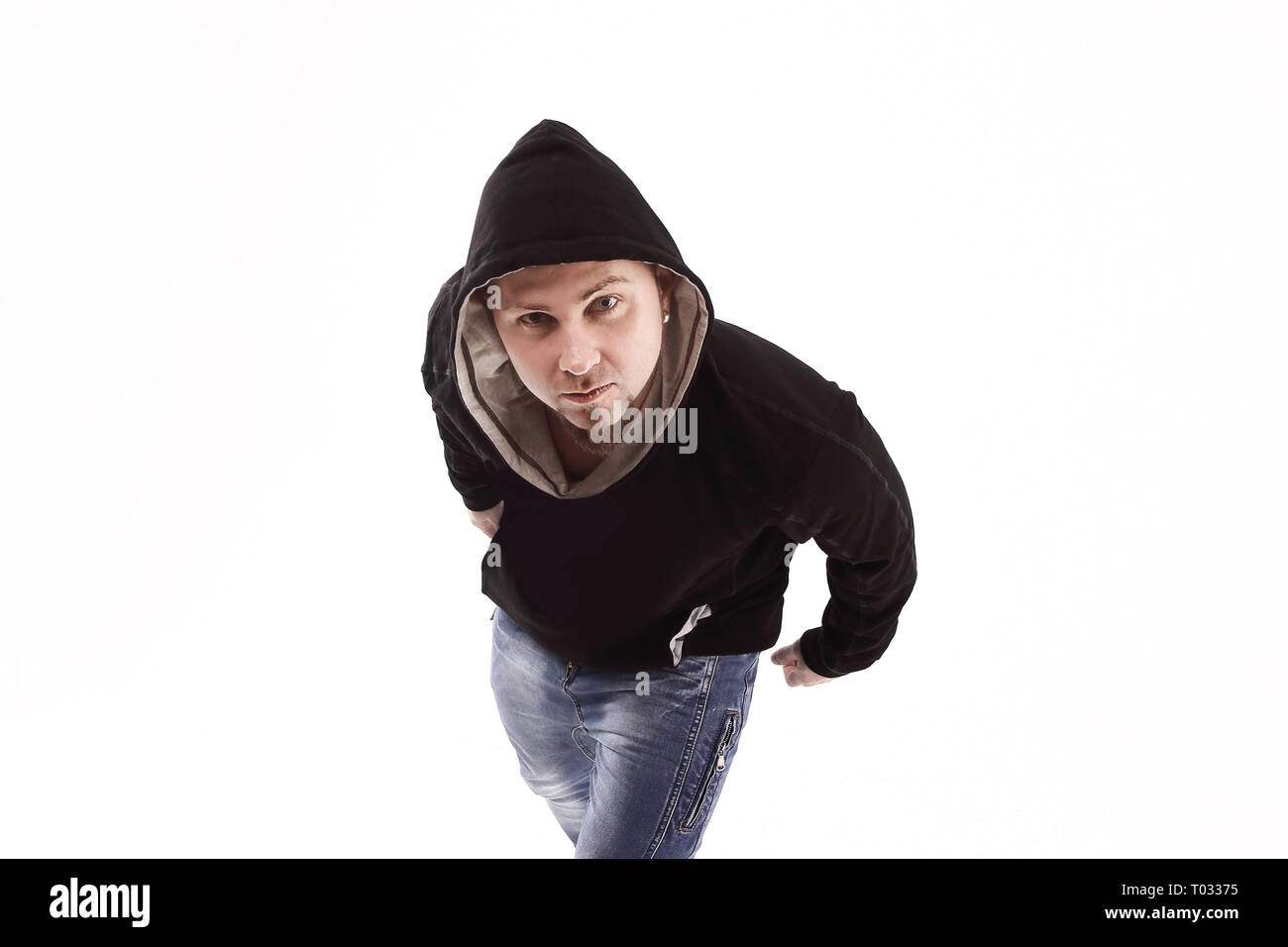 top view. stylish rapper guy looking at camera . isolated on white ...