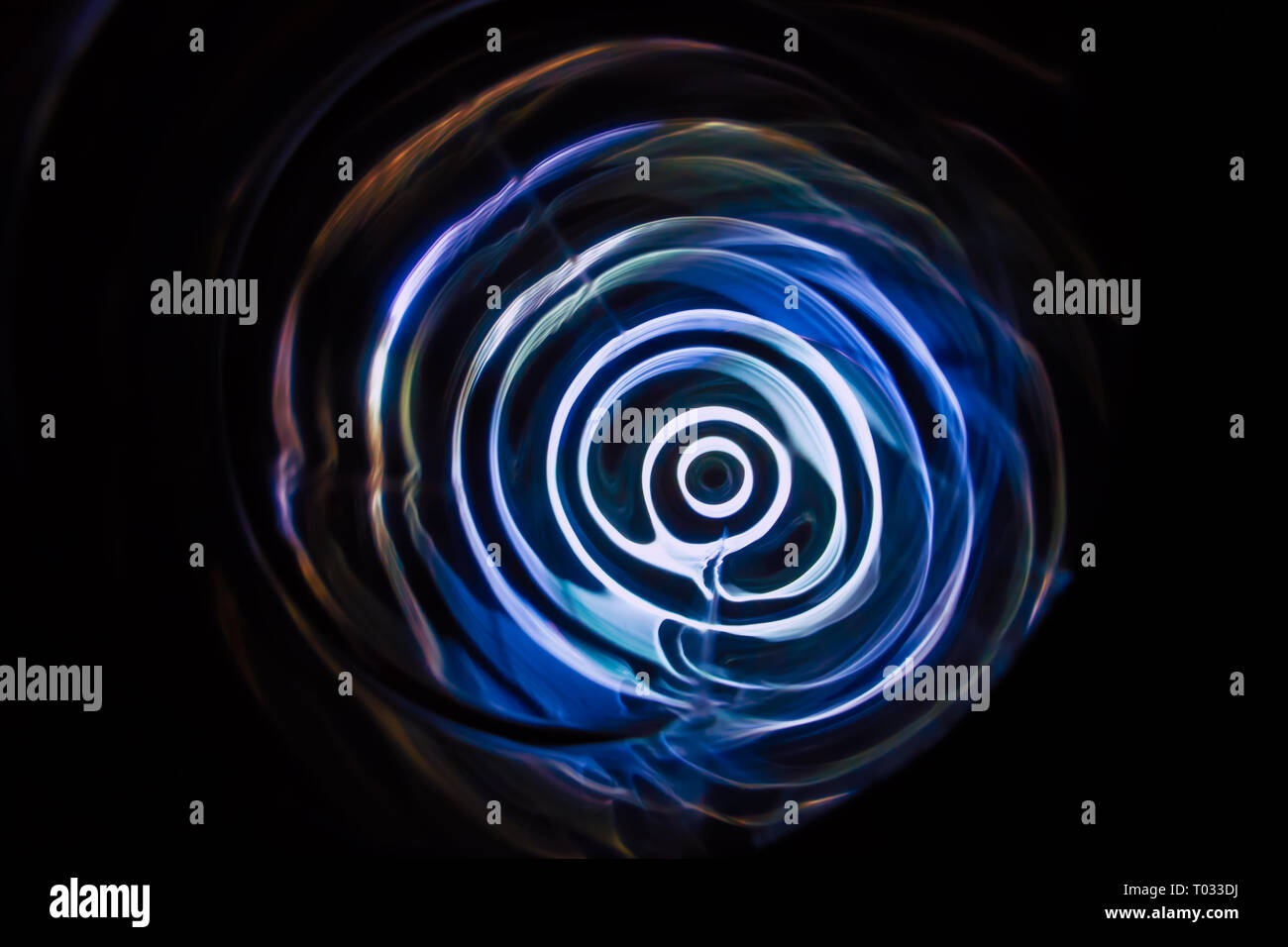 Sound waves in the visible blue color in the dark Stock Photo - Alamy