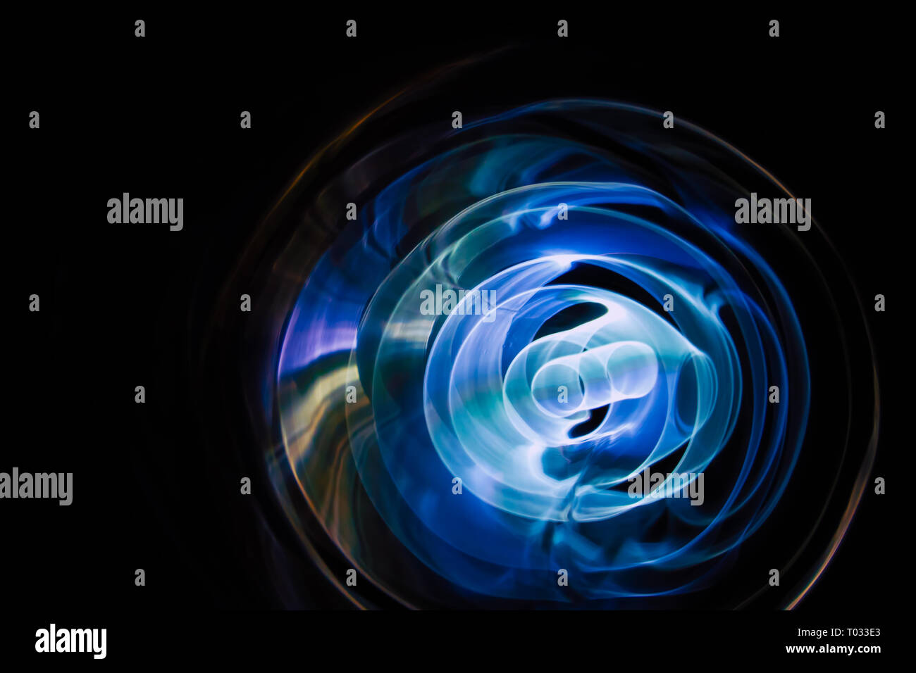Sound waves in the visible blue color in the dark Stock Photo - Alamy