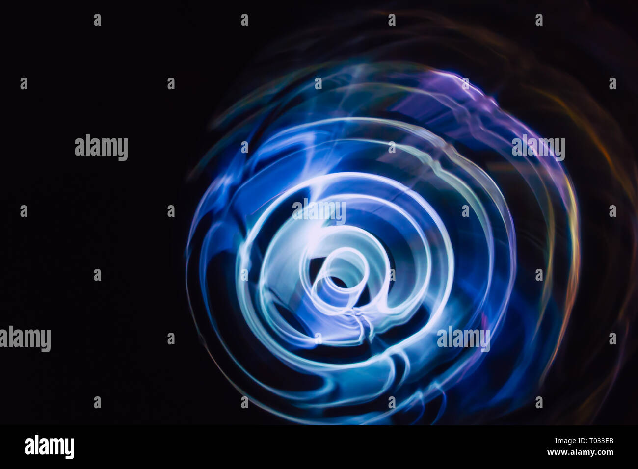 Sound waves in the visible blue color in the dark Stock Photo - Alamy
