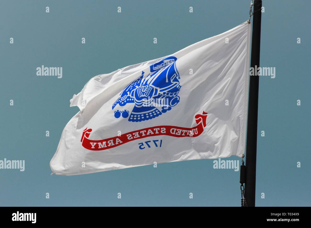 United States Army flag fluttering from a flagpole Stock Photo - Alamy