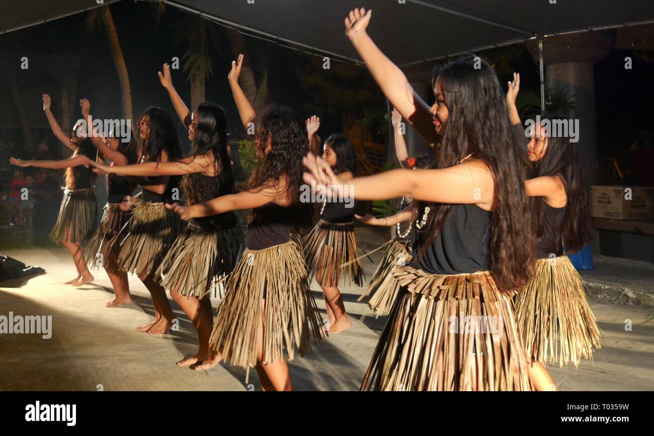 SAIPAN, CNMI—Pacific Island cultural dancers wearing coconut leaf ...