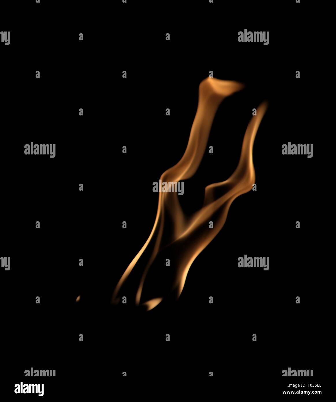 Artistic shapes from the flames of a burning torch with a dark ...