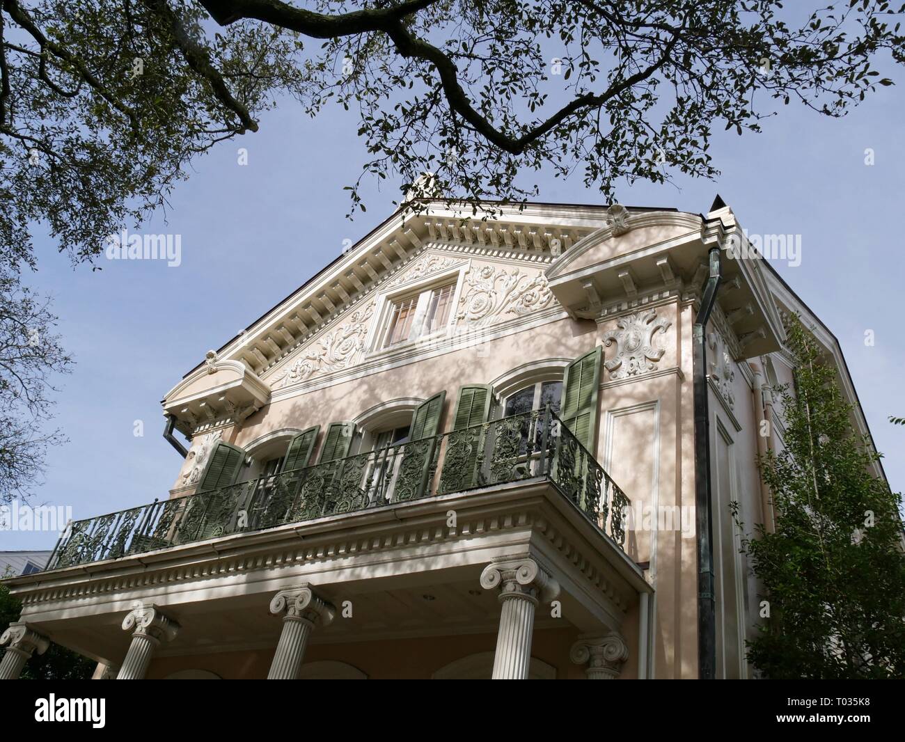 Balcony shot of one of the colonial houses along Charles Avenue in New ...