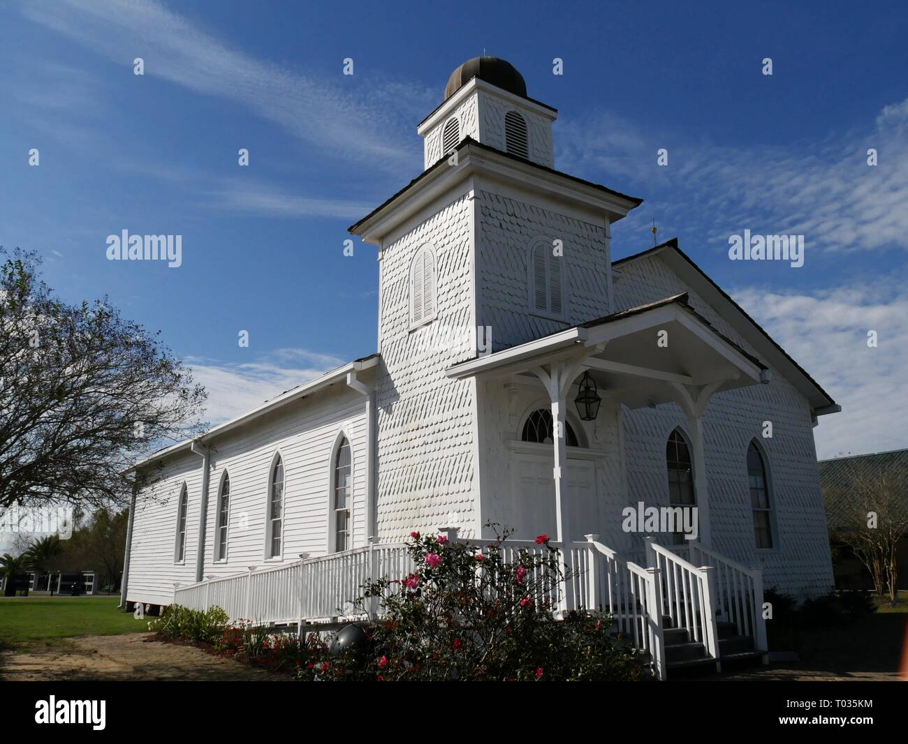 Semi-side view shot of a baptist church in a historic district with ...