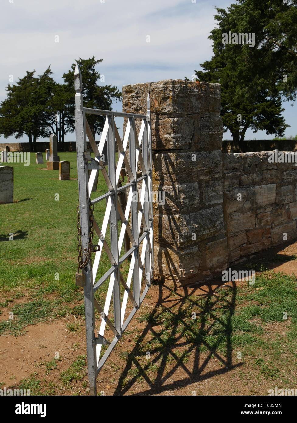 Steel gate to an old cemetery Stock Photo - Alamy