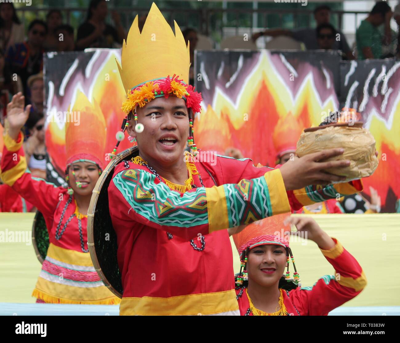 DAVAO CITY, PHILIPPINES—AUGUST 2014: Street dancers perform with fire ...
