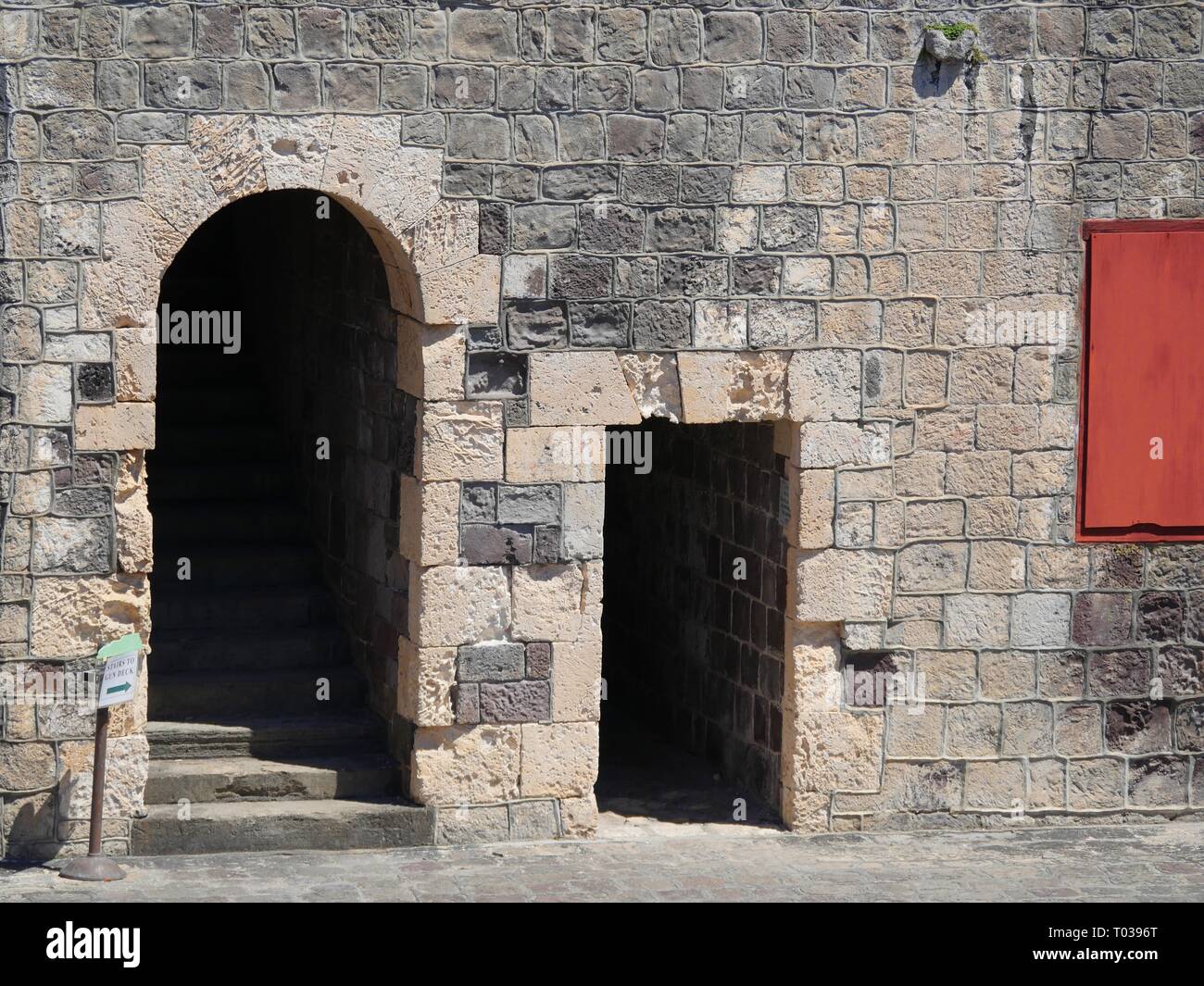 Arch and rectangular doors in an old brick building Stock Photo - Alamy