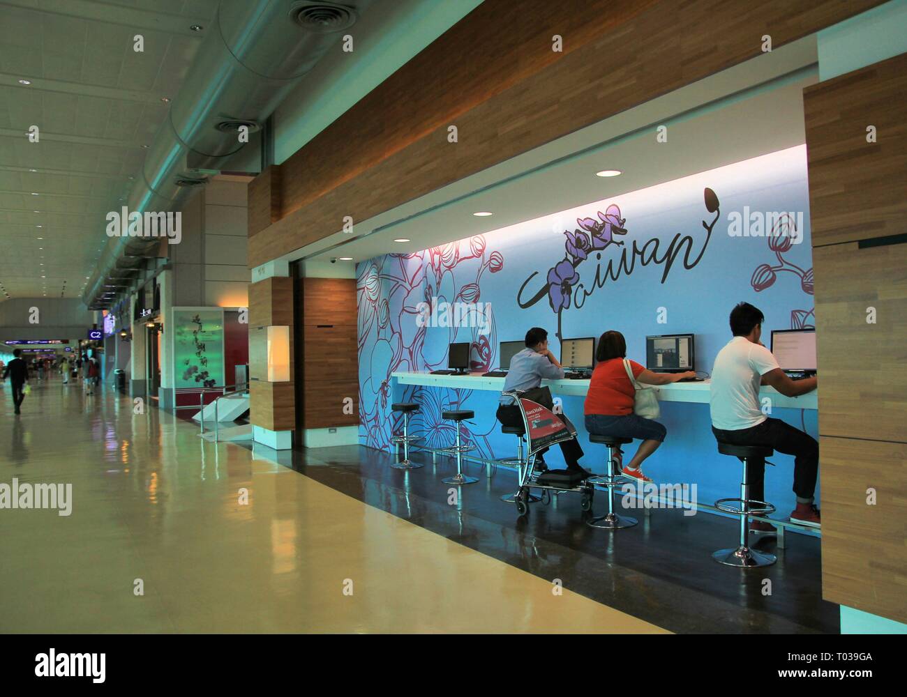 TAIPEI, TAIWAN—AUGUST 2014: Passengers use free computers with internet ...