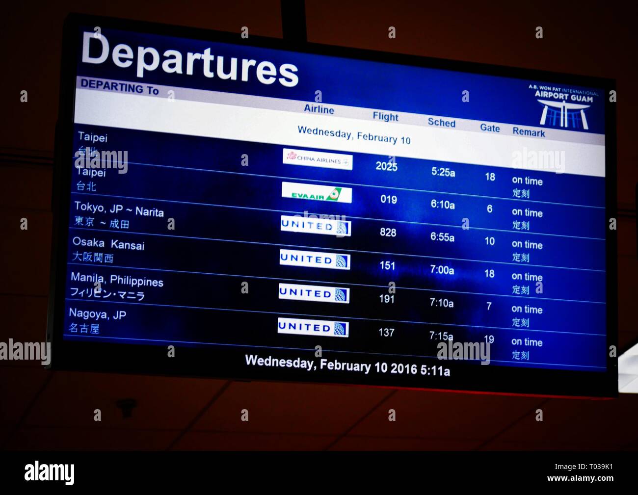 GUAM, USA—FEBRUARY 2016: Flight status board inside the Guam ...
