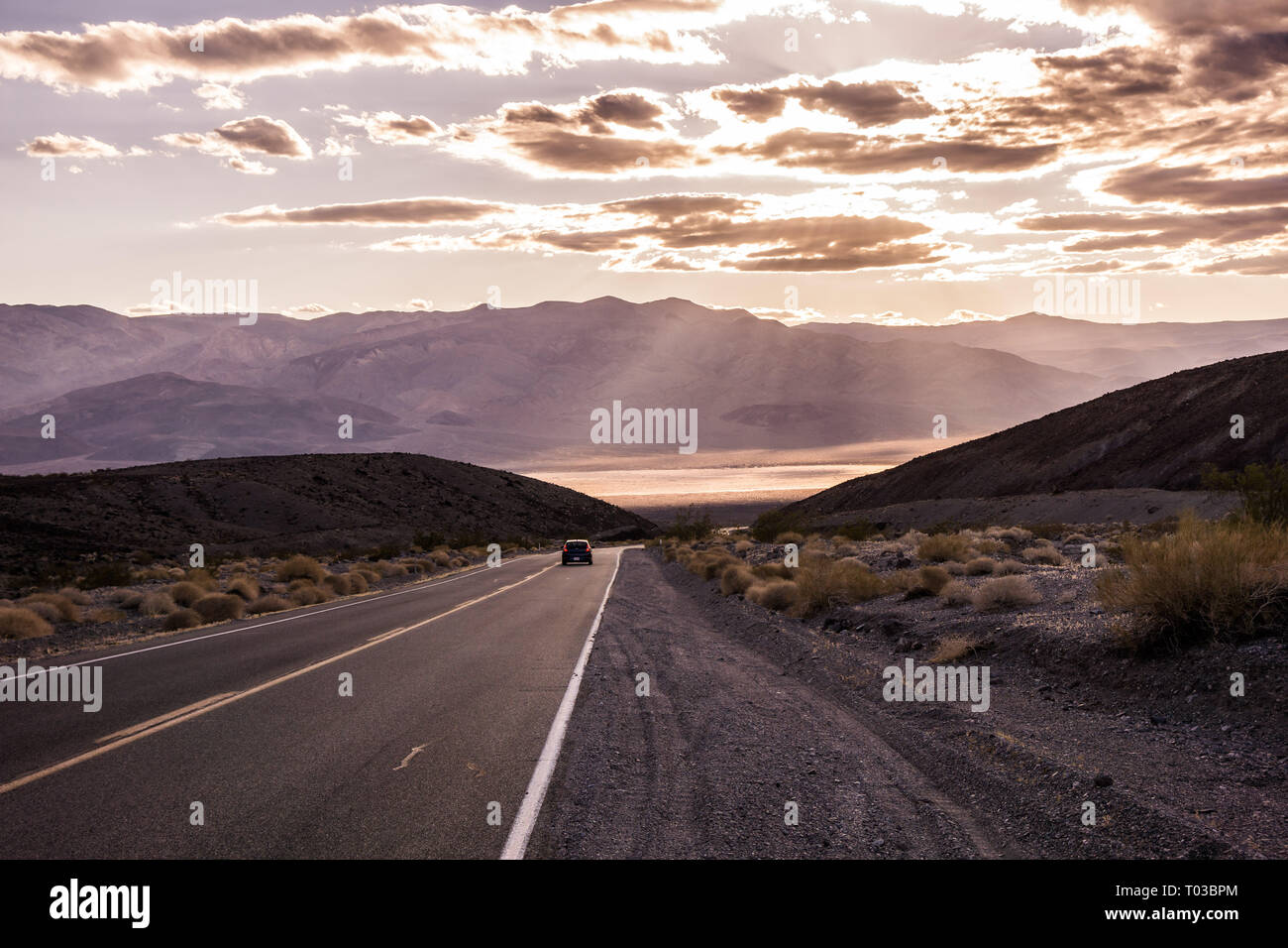 Driving into the sunset along CA-190 just east of Panamint Springs in ...