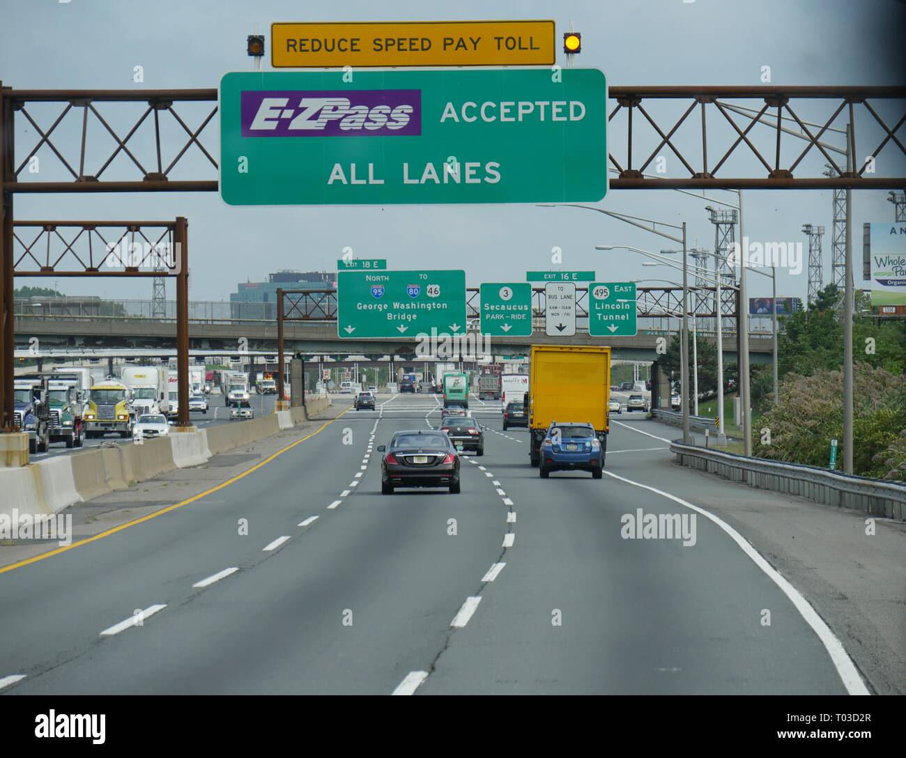 NEW YORK CITY, USA—SEPTEMBER 2017: Directional signs and pay toll ...