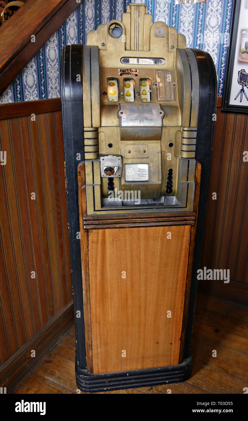 DODGE CITY, KANSAS—SEPTEMBER 2017: Antique wooden slot machine ...