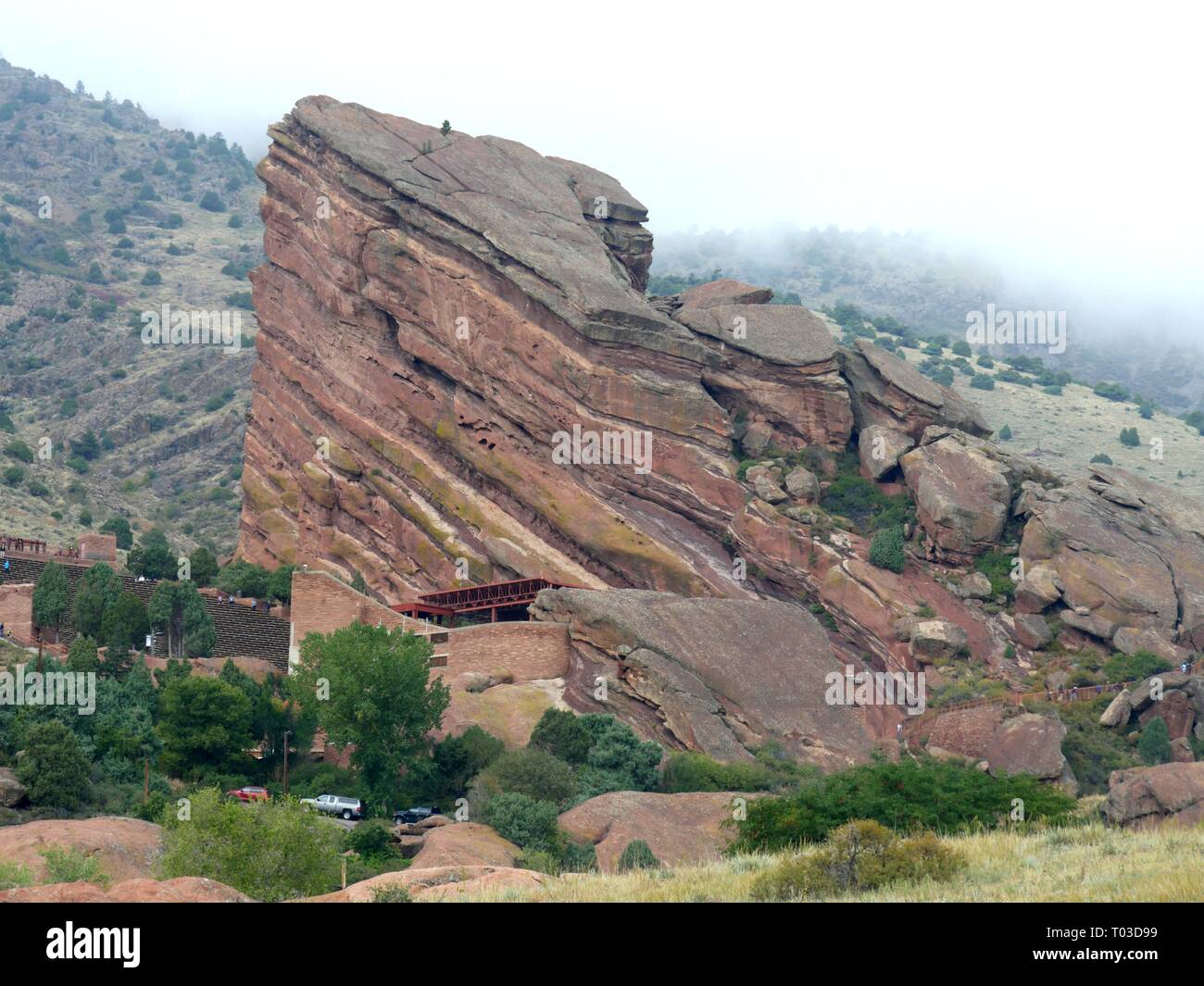 Huge boulders of natural rock formation tower above the Red Rocks ...