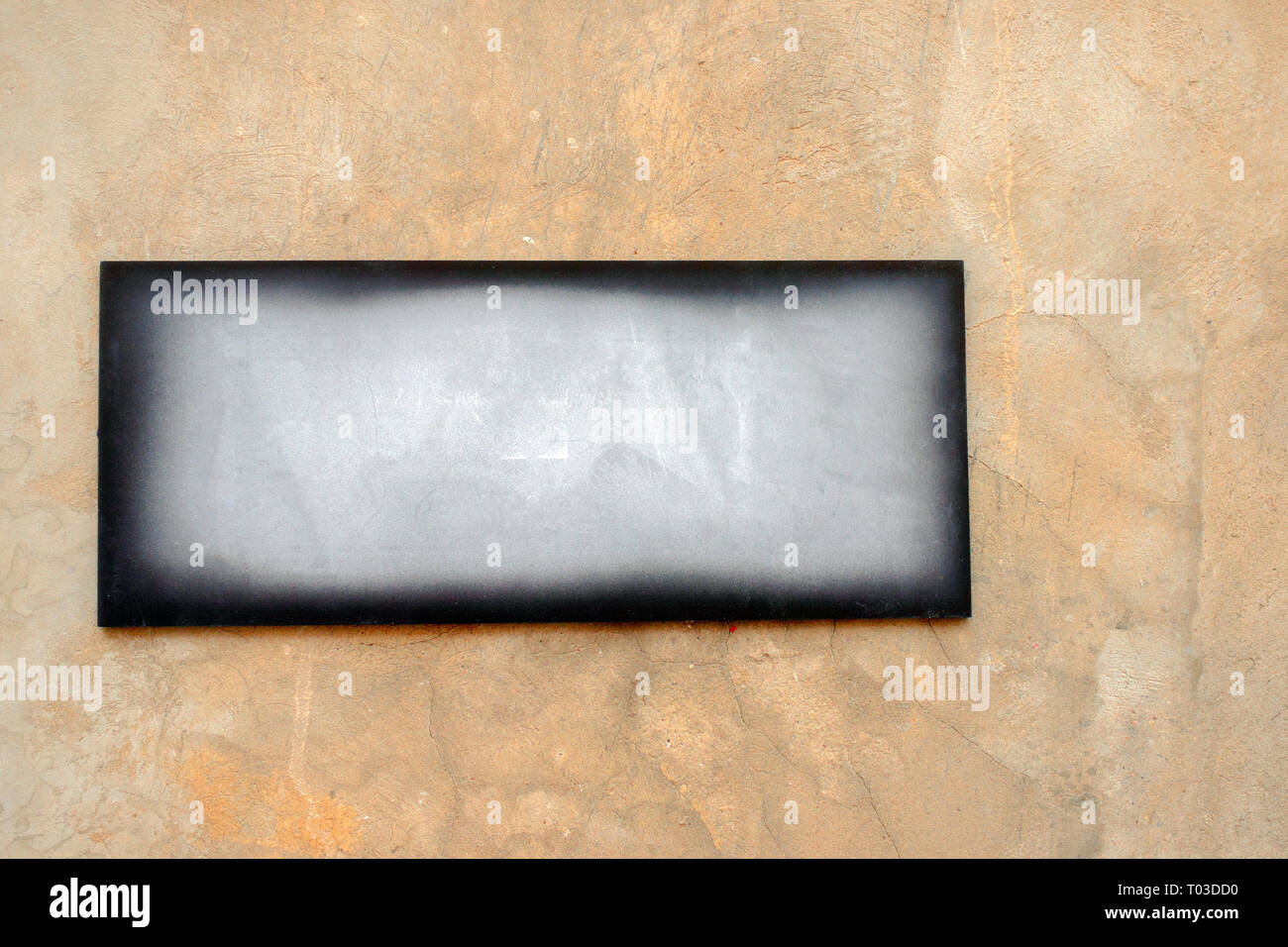 Mock up. Blank empty rectangle shape signboard on the building wall ...